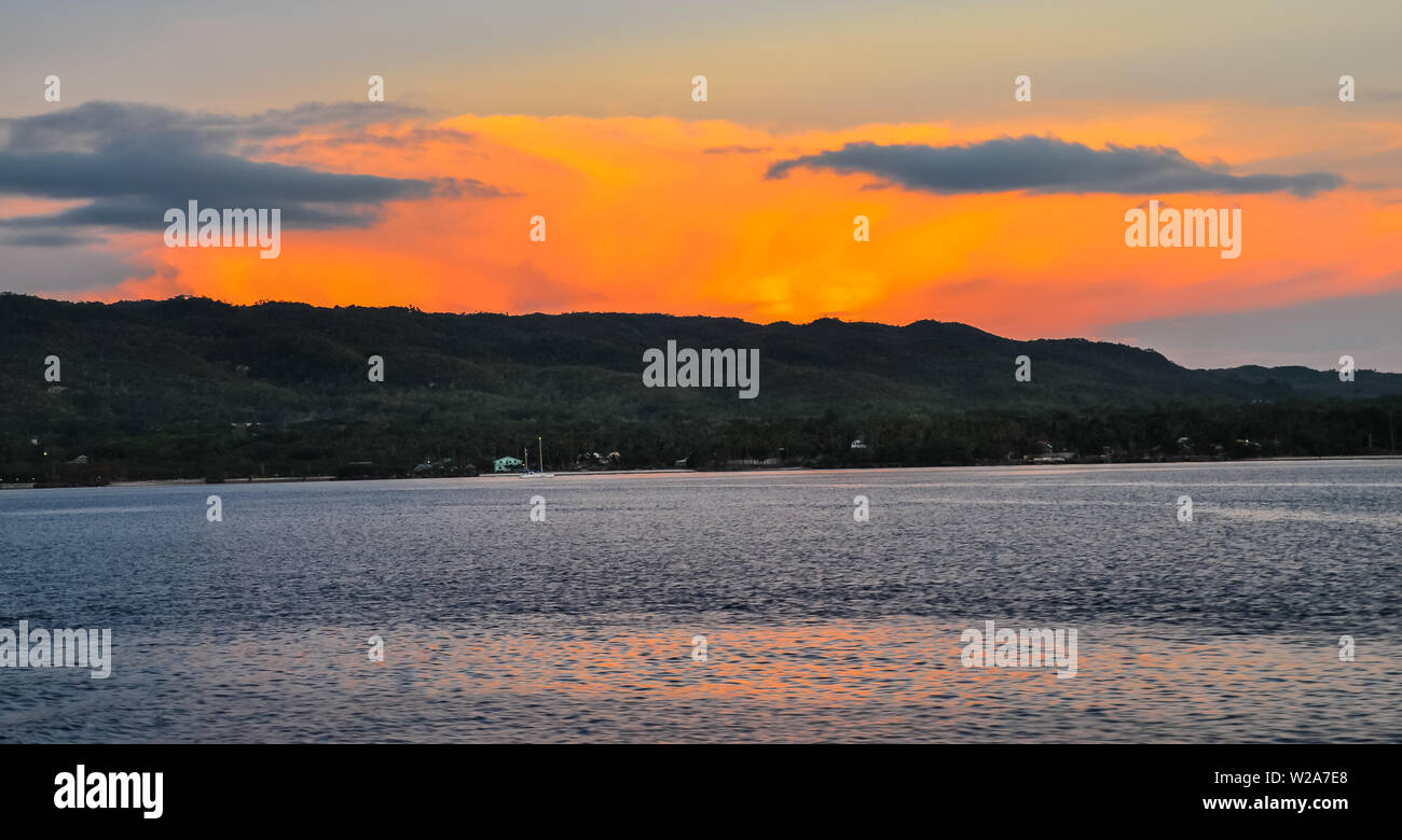 Eerie golden cloud formation over the island of Siquijor, Philippines ...