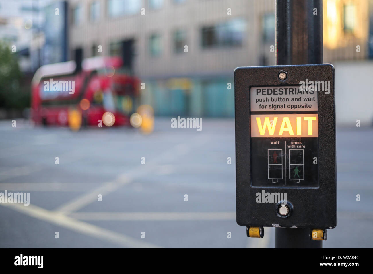 London cross lights with crossing light "Wait" sign Stock Photo - Alamy
