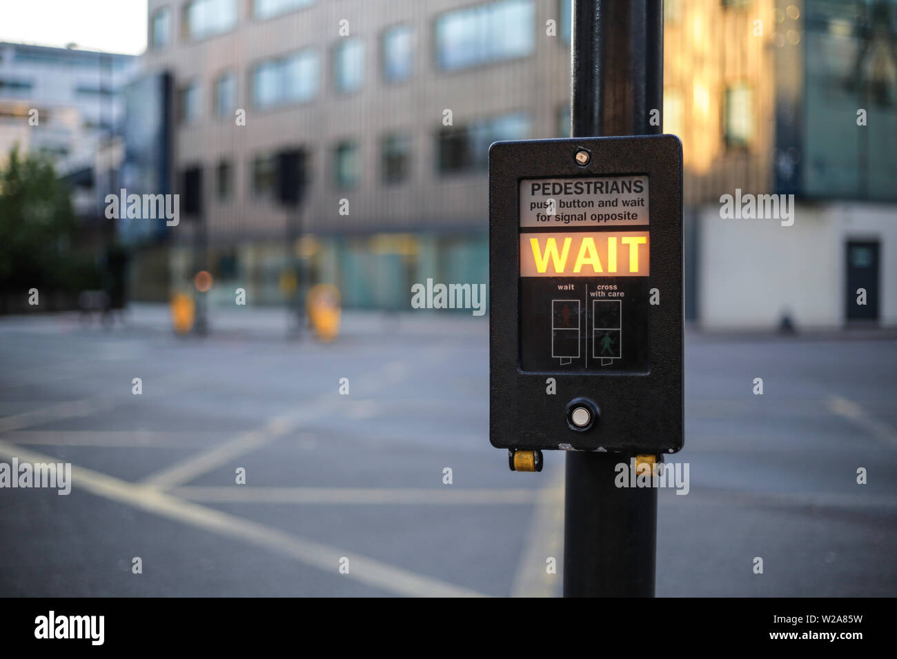 London cross lights with crossing light "Wait" sign Stock Photo - Alamy