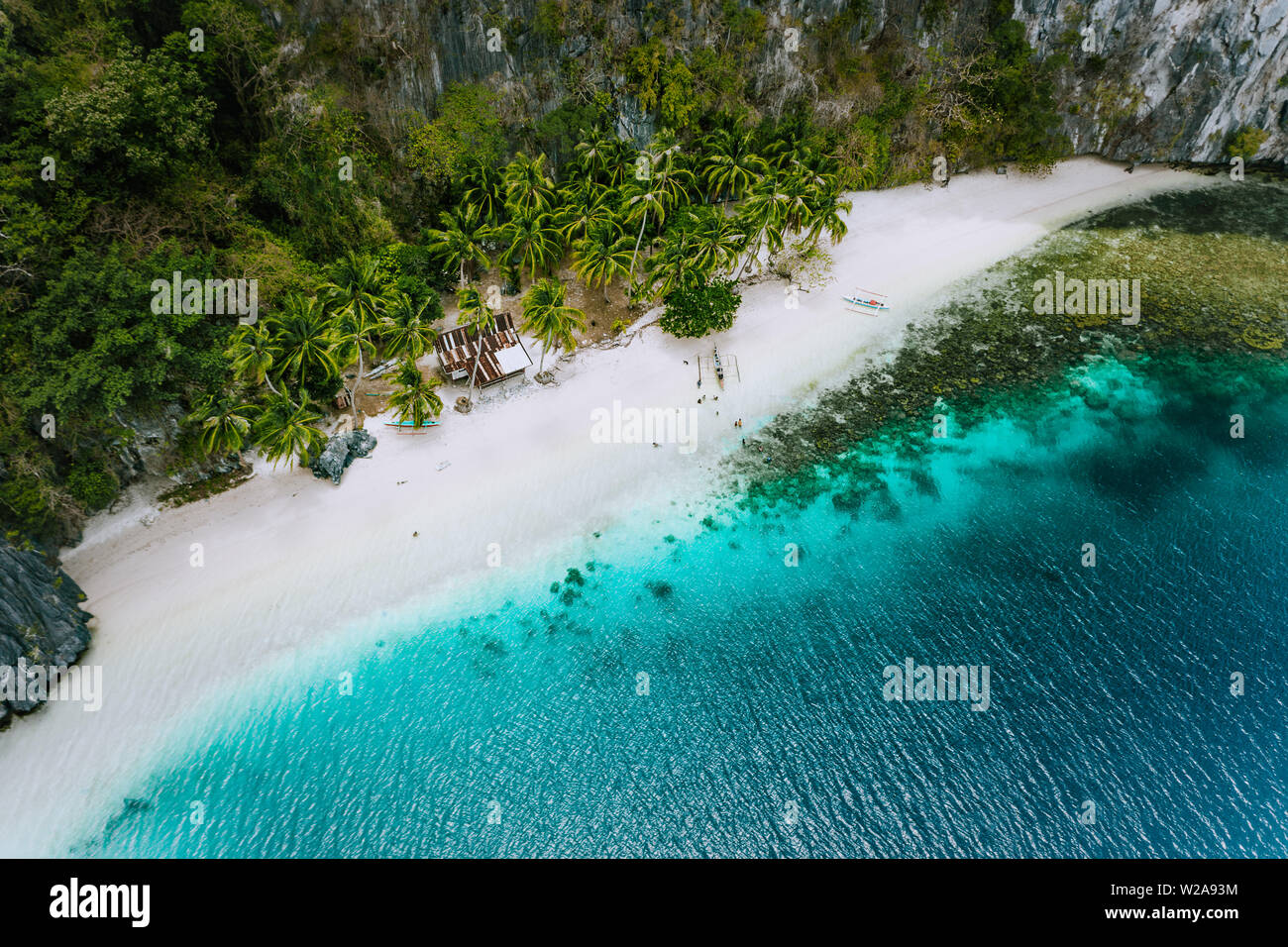 Aerial drone view of abandoned house hut on Pinagbuyutan Island in El ...