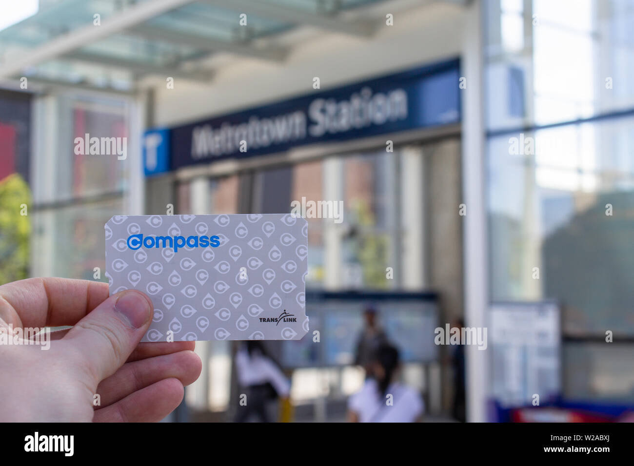 Hand holding a Translink Compass Card Stock Photo - Alamy