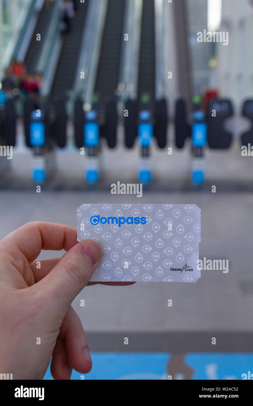 Hand holding a Translink Compass Card Stock Photo - Alamy