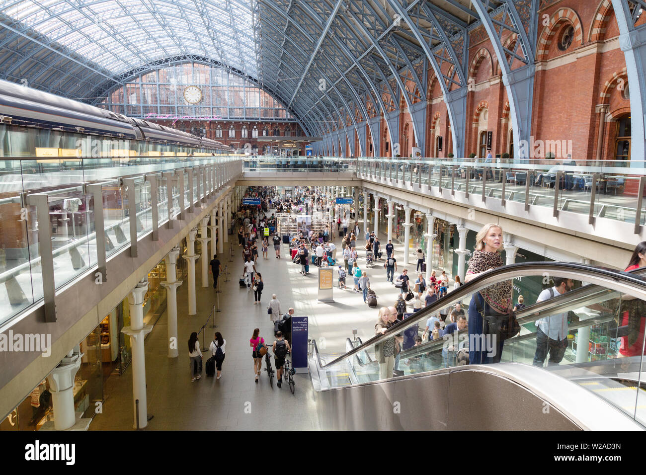 St Pancras station - Passengers in the forecourt on the concourse in ...