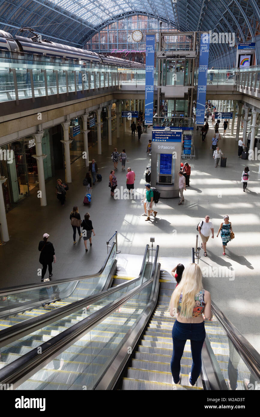 St Pancras station - Passengers on the concourse in the interior of St ...