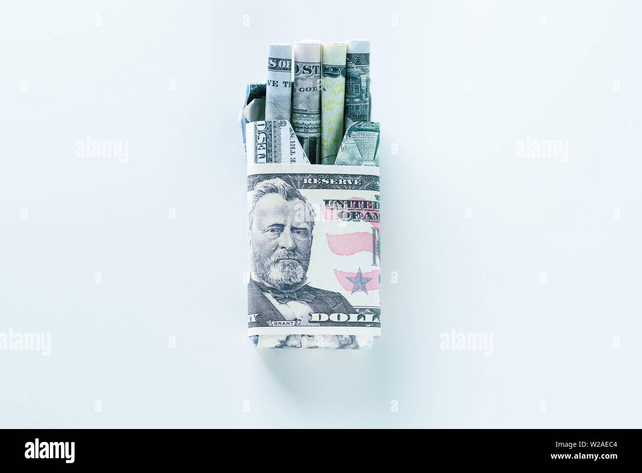 Package of cigarette filled with paper money dollars banknote instead ...