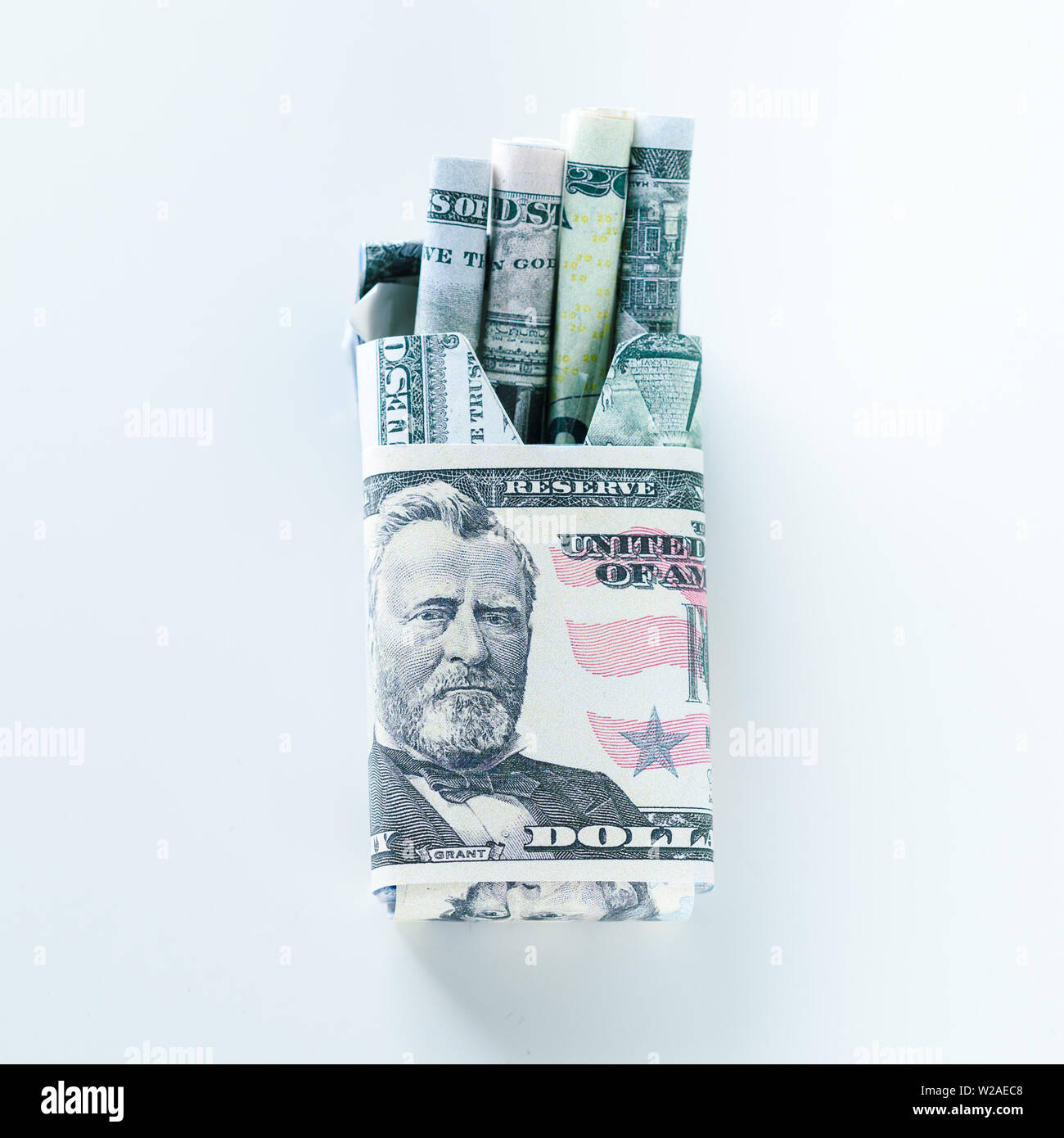 Package of cigarette filled with paper money dollars banknote instead ...