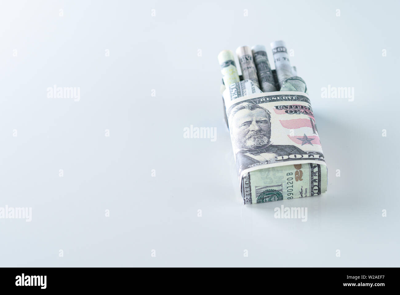 Package of cigarette filled with paper money dollars banknote instead ...