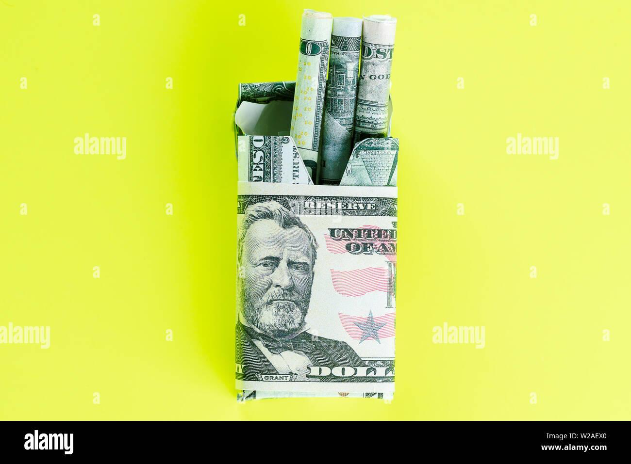 Burning money cigarette hi-res stock photography and images - Alamy