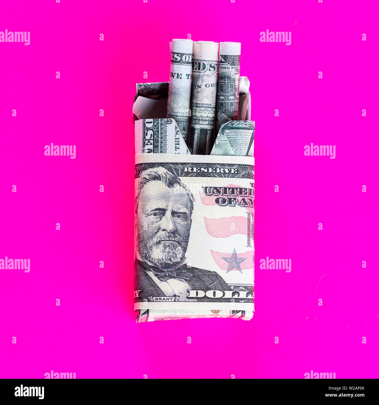Package of cigarette filled with paper money dollars banknote instead ...