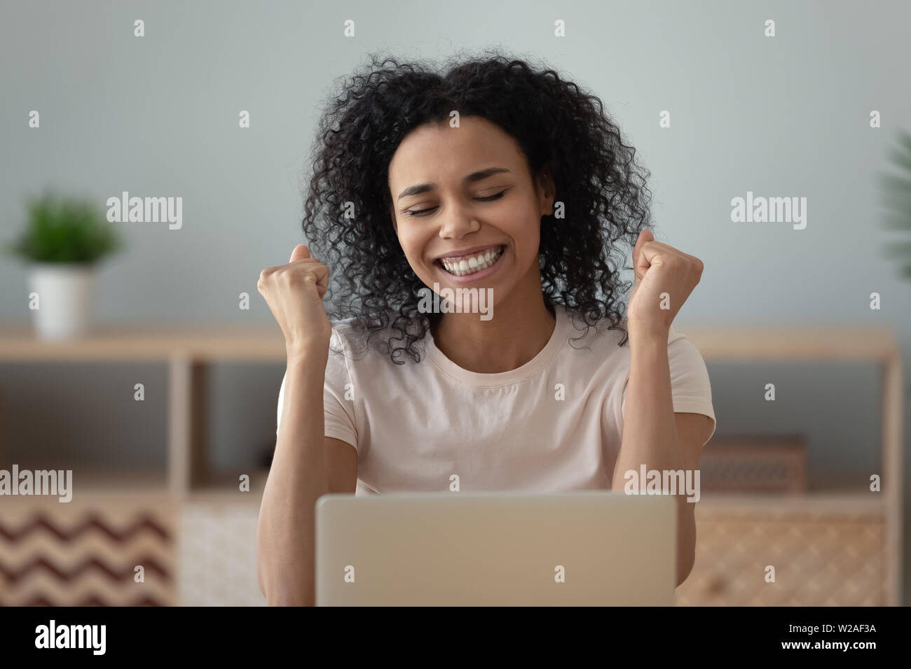 Overjoyed happy african girl student celebrate great exam results Stock ...