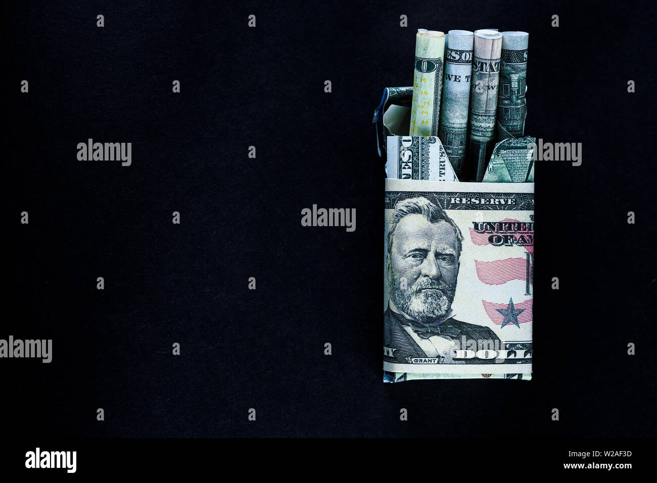 Burning money cigarette hi-res stock photography and images - Alamy