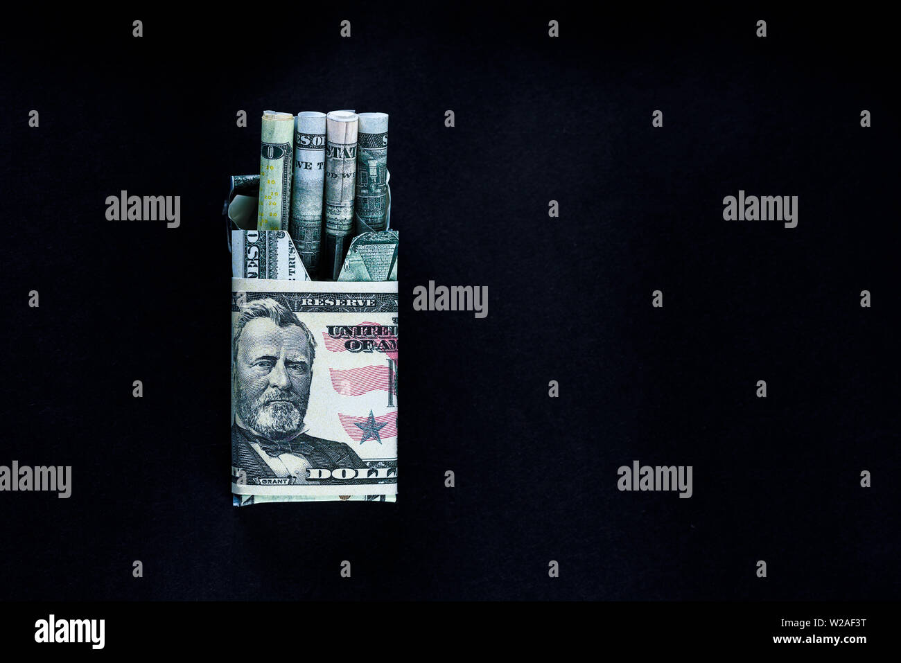 Burning money cigarette hi-res stock photography and images - Alamy