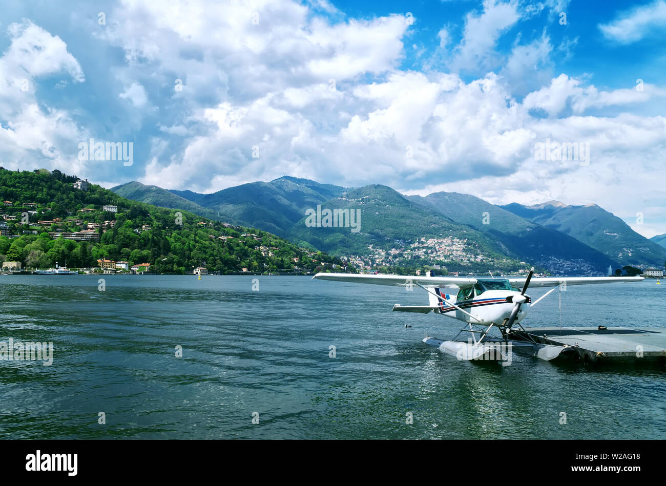 Red floatplane or seaplane moored on Como lake Stock Photo - Alamy