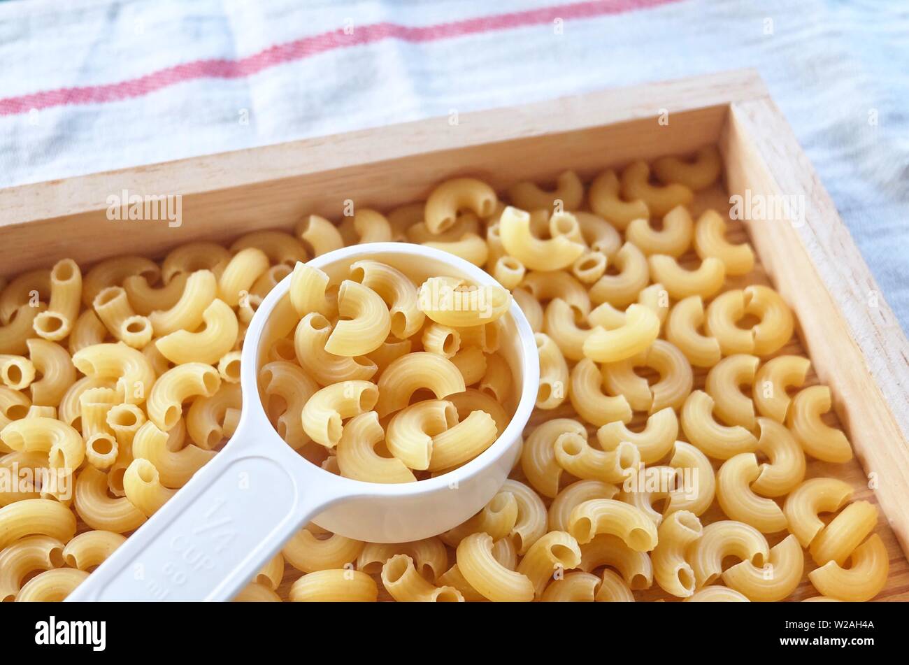 Food and Cuisine, Uncooked and Dried Elbow Macaroni or Gomiti Pasta in ...
