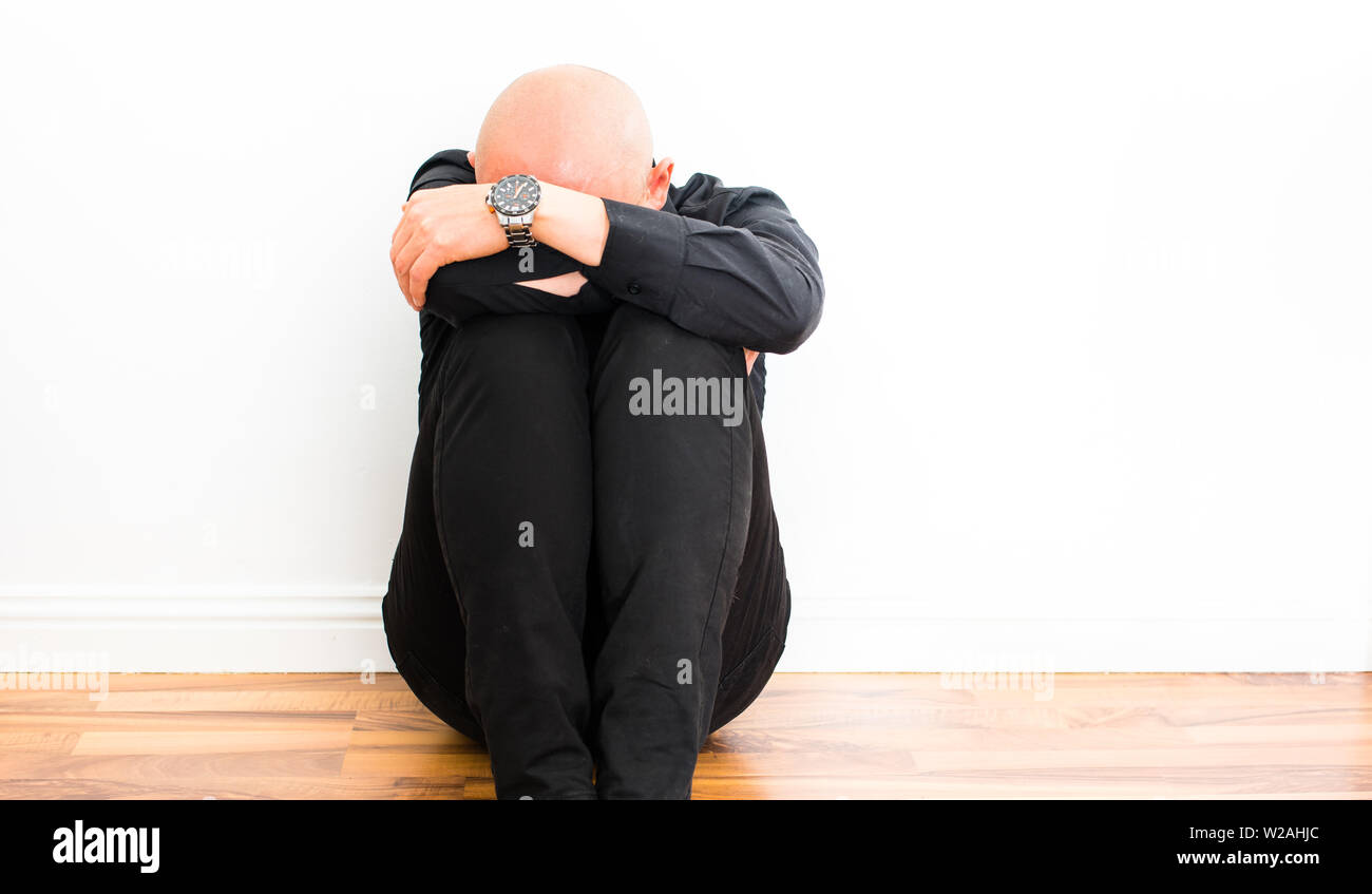 Man Crying Sitting On Floor High Resolution Stock Photography and ...