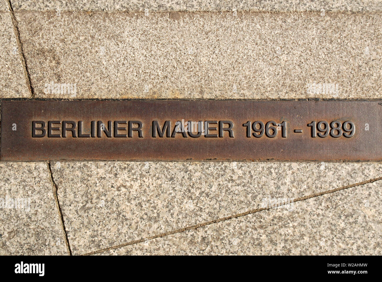 Marking the course of the Berlin Wall at Potsdamer Platz in Berlin ...