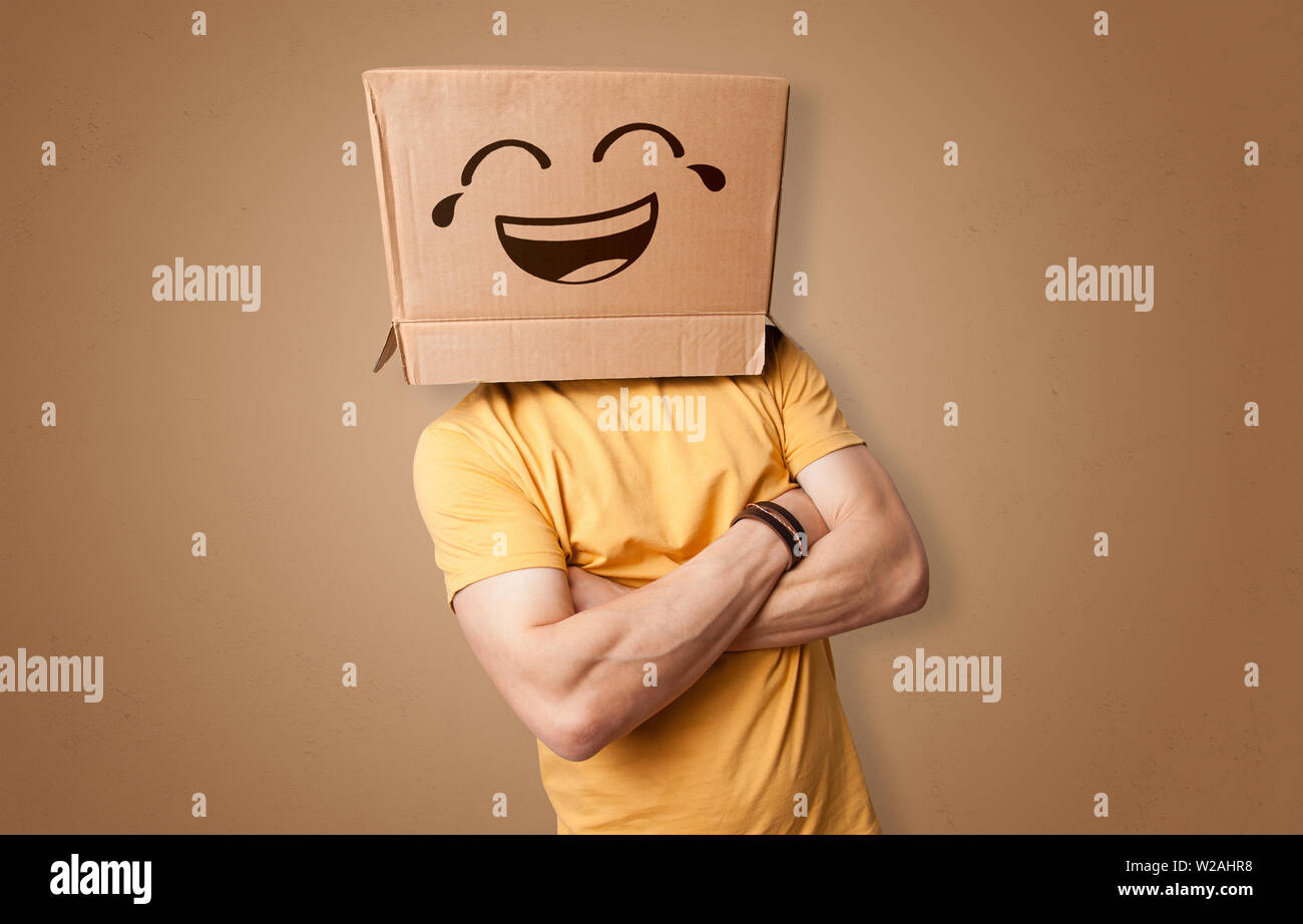 Funny man wearing cardboard box on his head with smiley face Stock ...