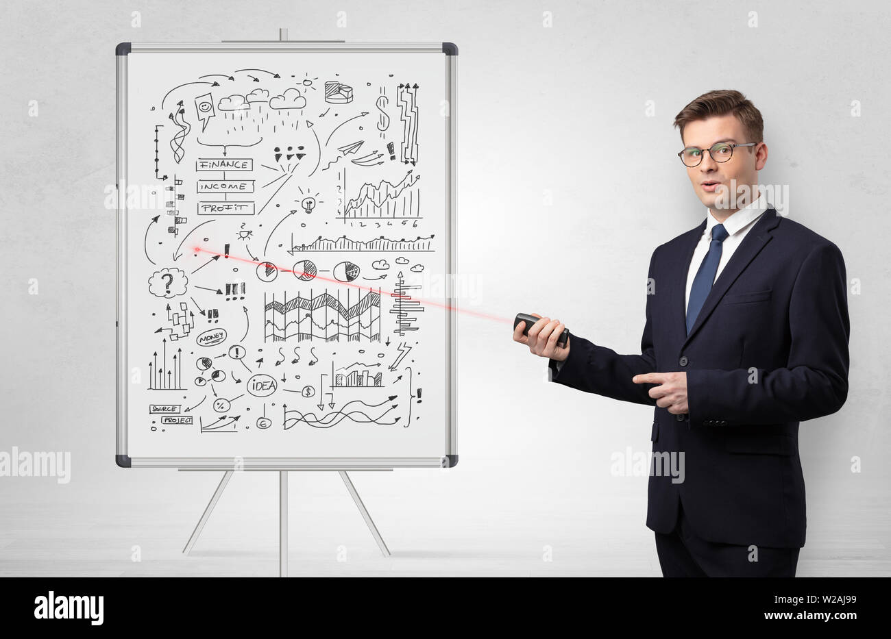 Professor with laser pointer teaching business theories Stock Photo - Alamy