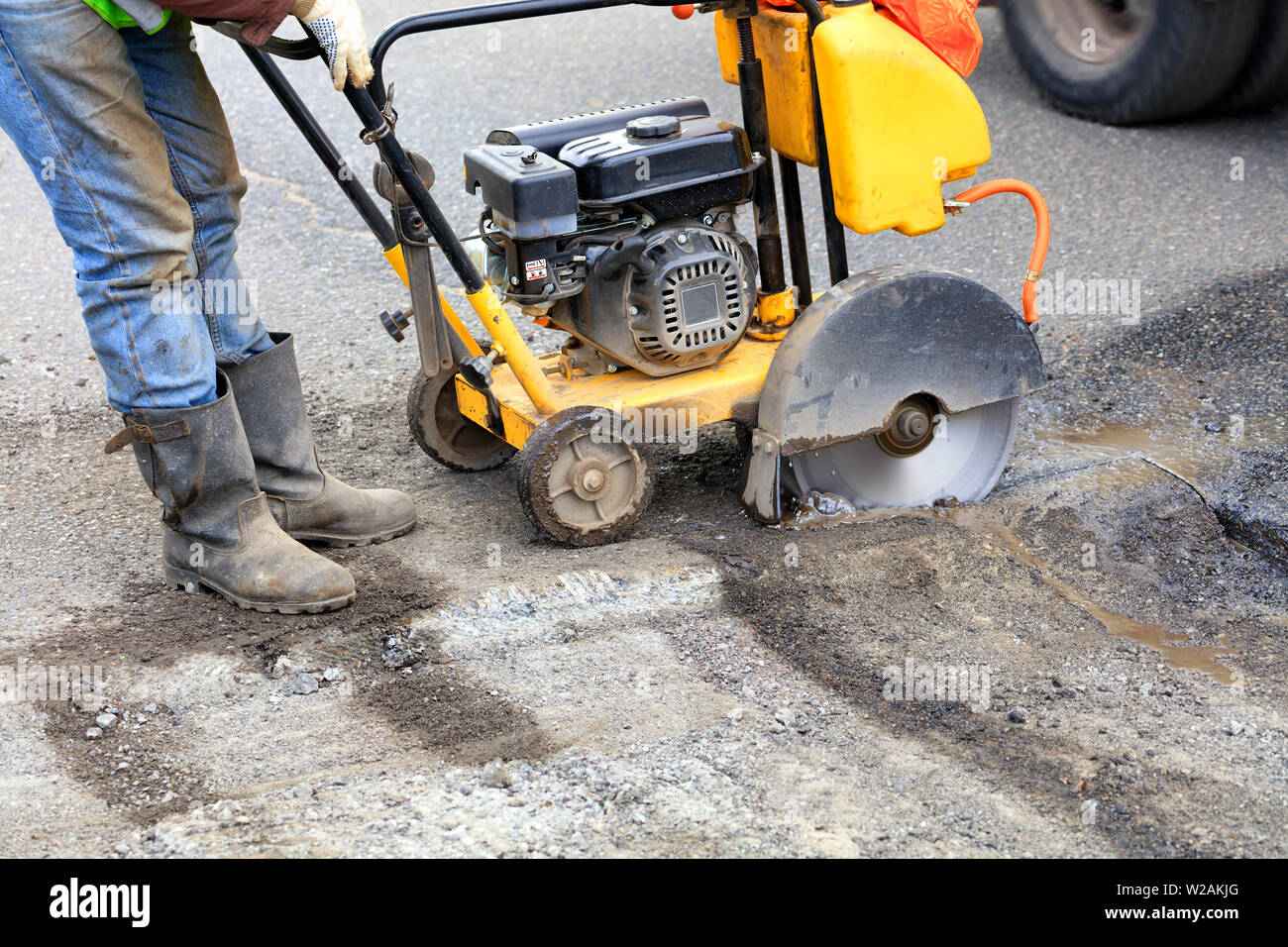 Construction worker asphalting a roadway hi-res stock photography and ...