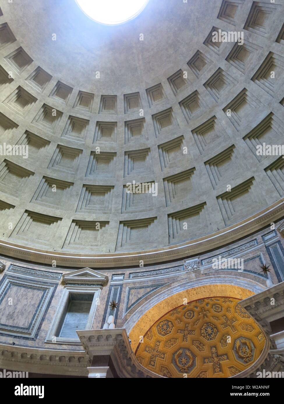View looking up to the open dome of the Pantheon in Rome, showing the ...