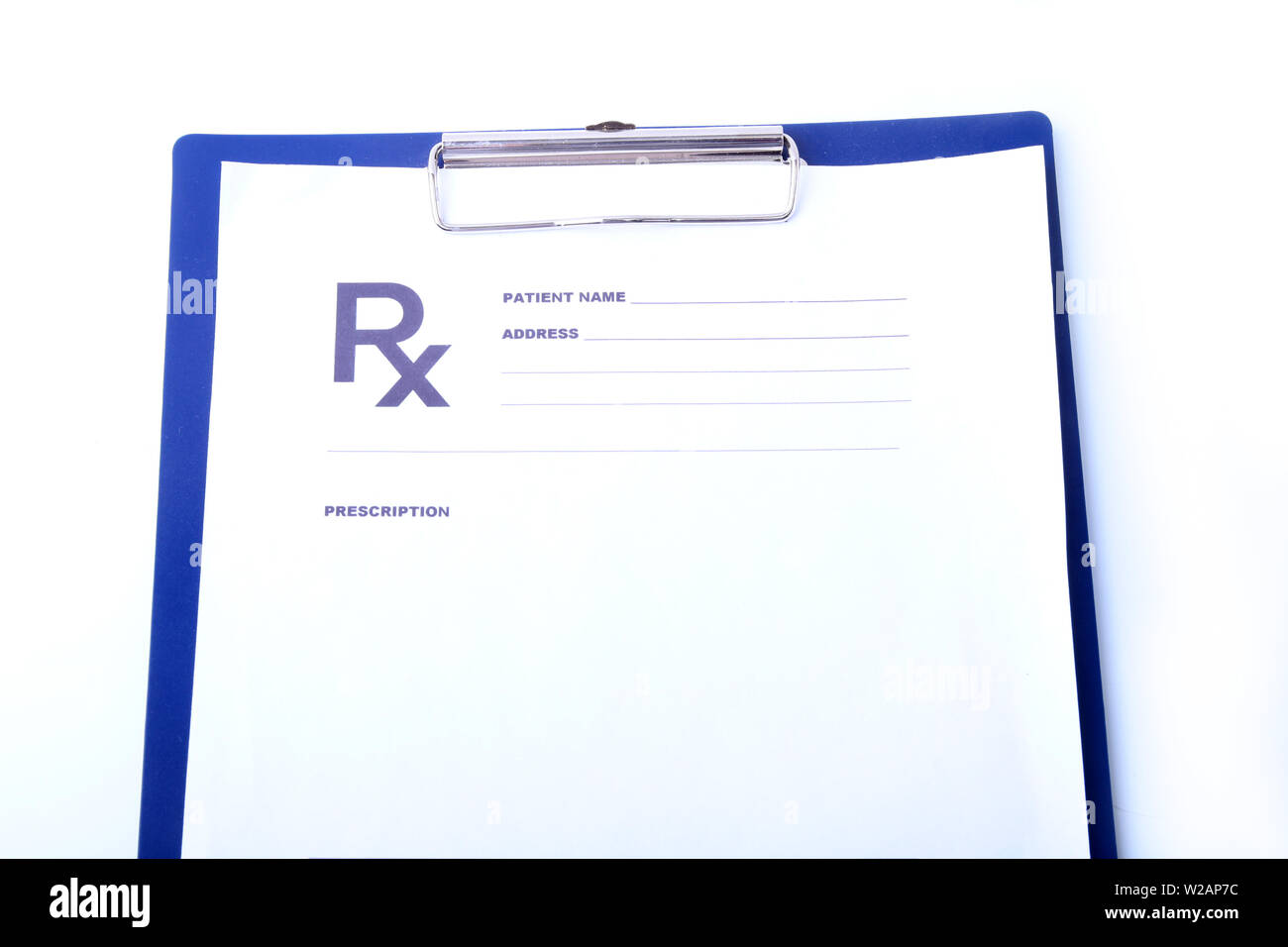 Closeup of medical stethoscope on a rx prescription, red heart isolated ...