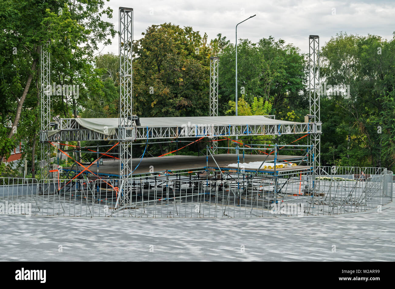 Installation and preparing the street stage for an open-air concert and ...
