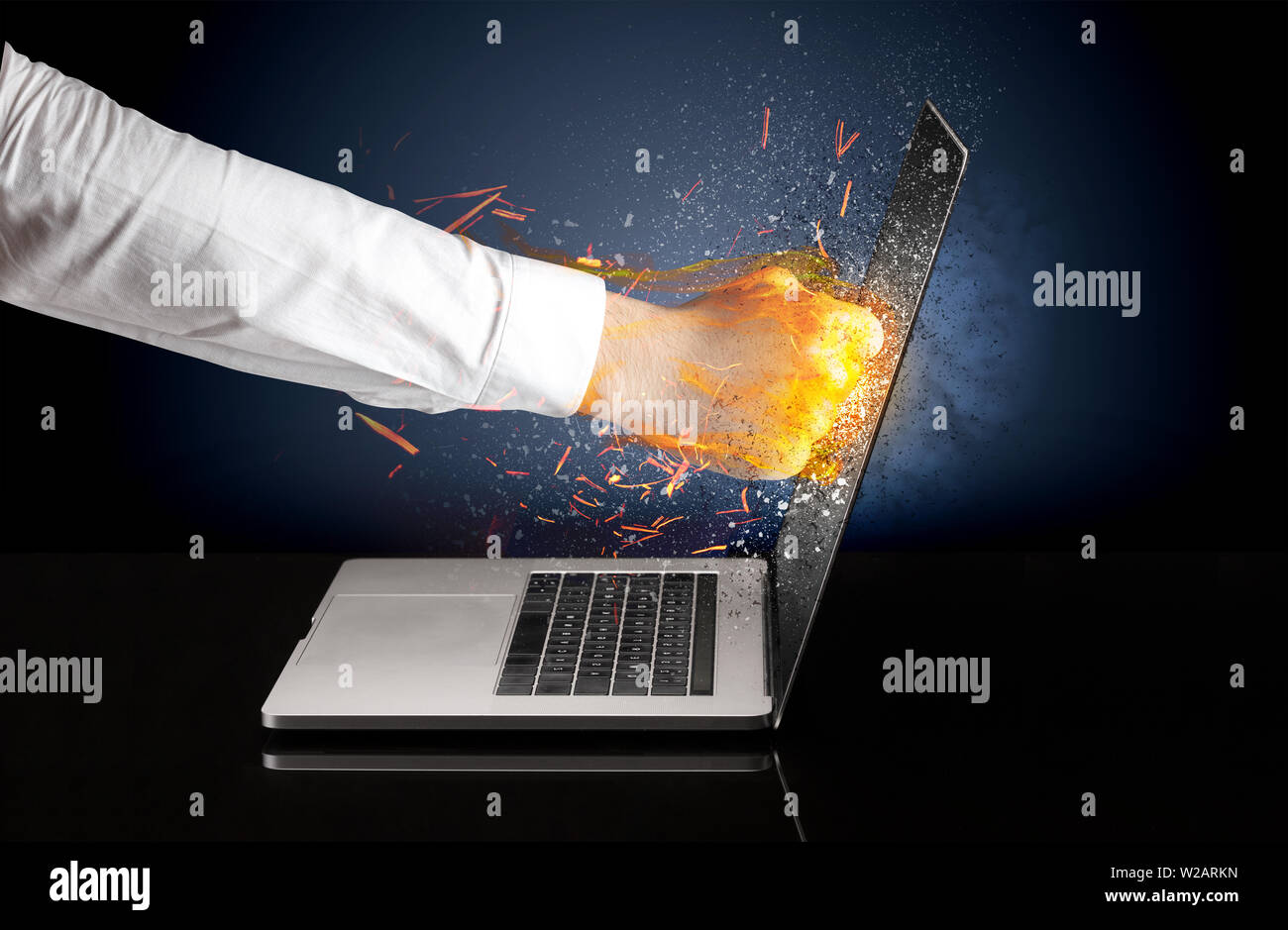 Arm hitting strongly laptop screen which breaks in little pieces Stock ...