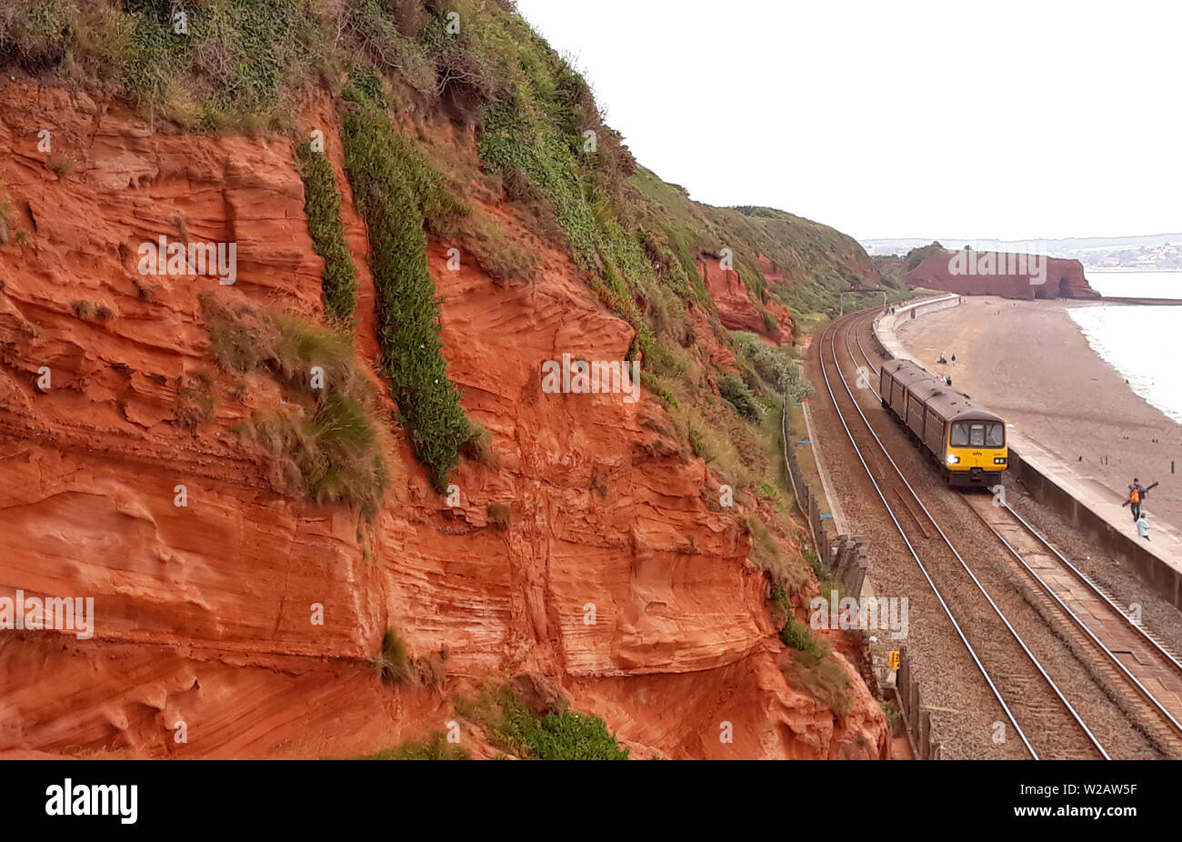 Dawlish, Devon: Red sandstone cliffs in foreground as a GWR / Great ...