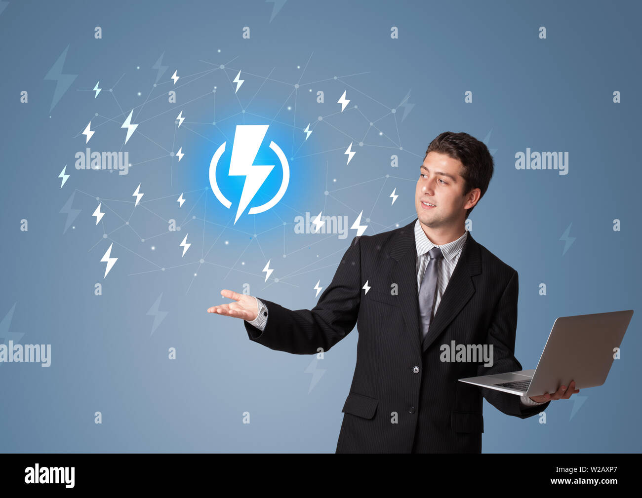 Young smiling person presenting battery life concept Stock Photo - Alamy