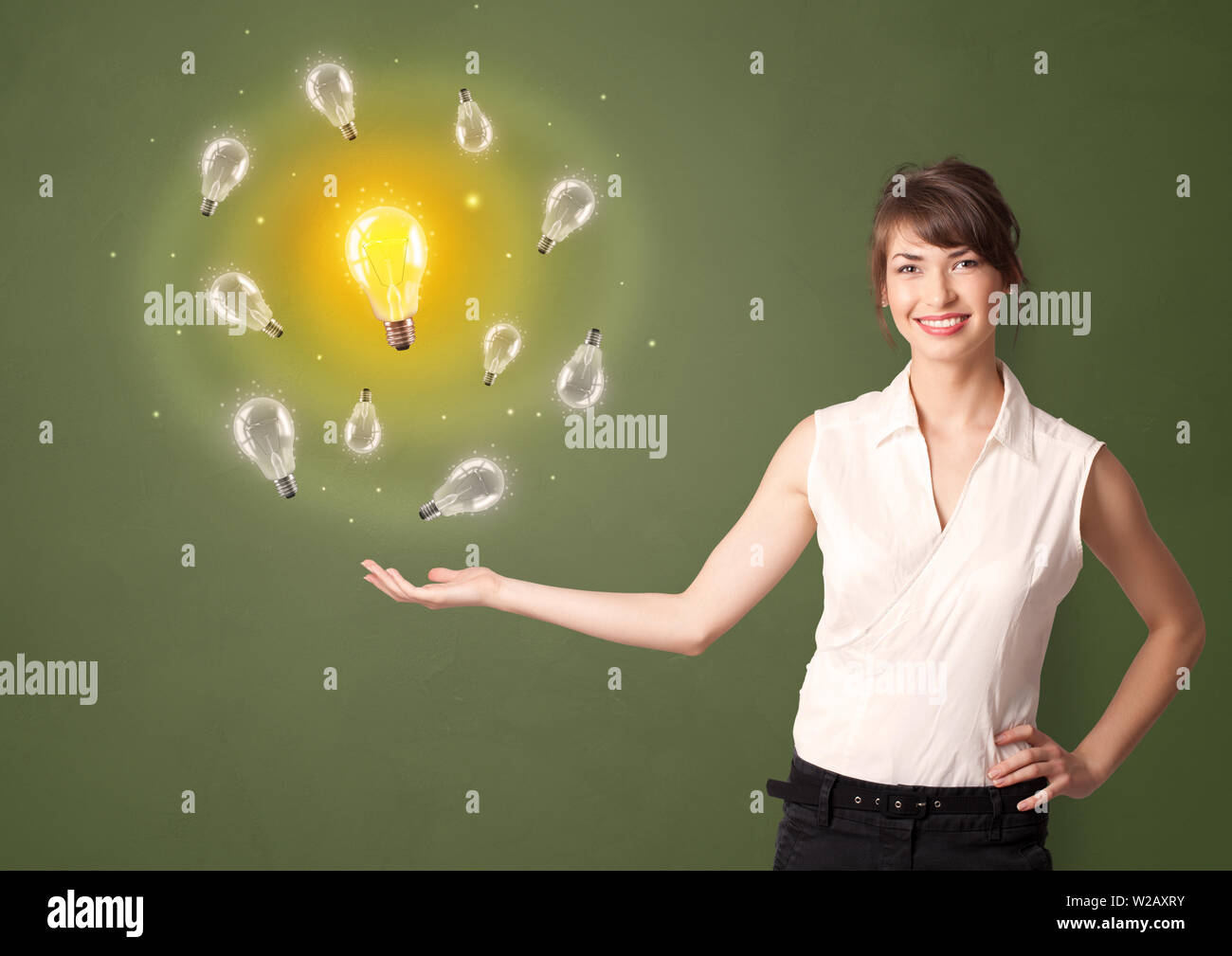 Young smiling person presenting new idea concept Stock Photo - Alamy