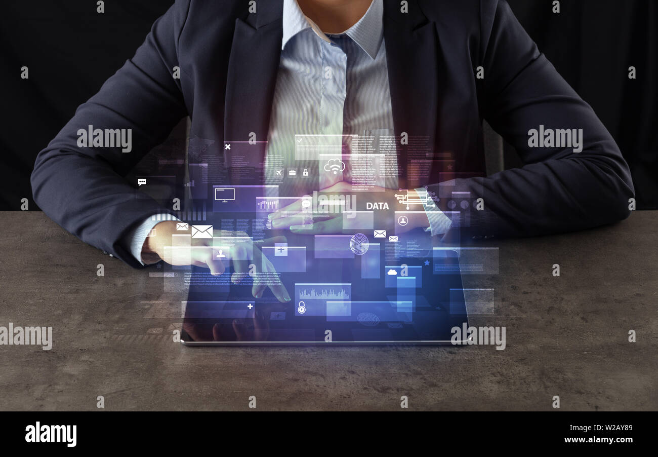 Business woman working on tablet with global database concept and dark ...