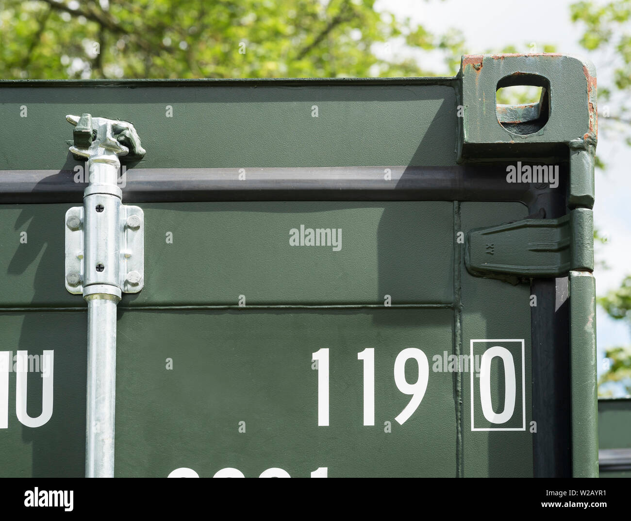 A close up of an international shipping container showing the corner ...