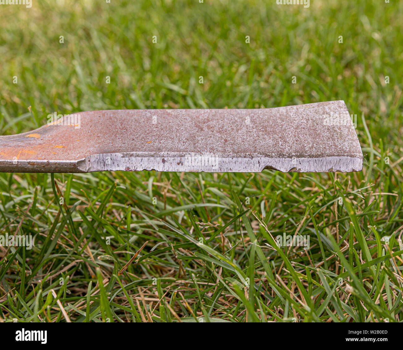 Lawn Mower Blade That Is Rusty Damaged And Dull And Needing Sharpened Lawn Mower Blade That Is Rusty Damaged And Dull And Needing Sharpened