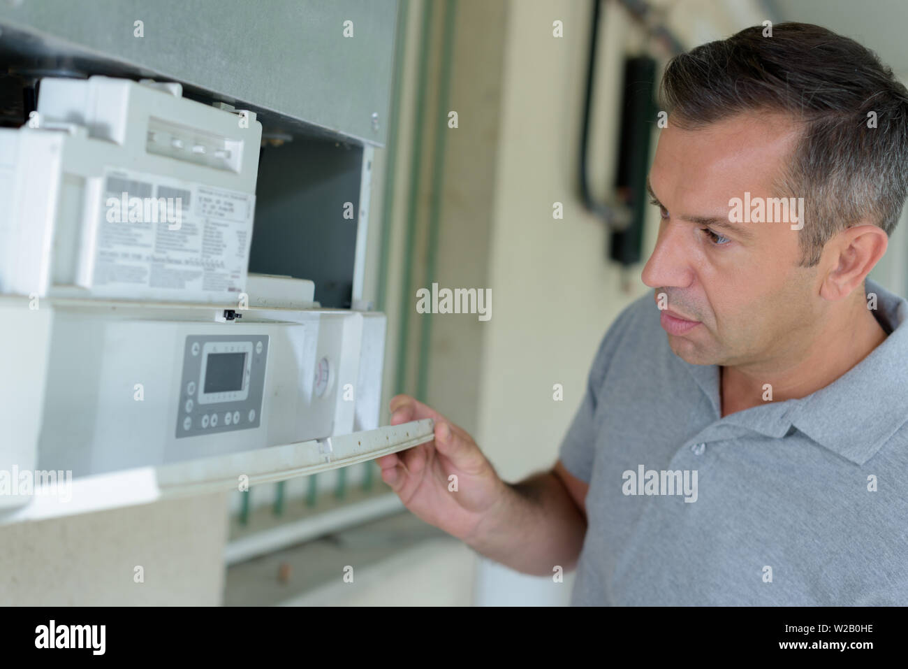 middle aged technician at work Stock Photo - Alamy