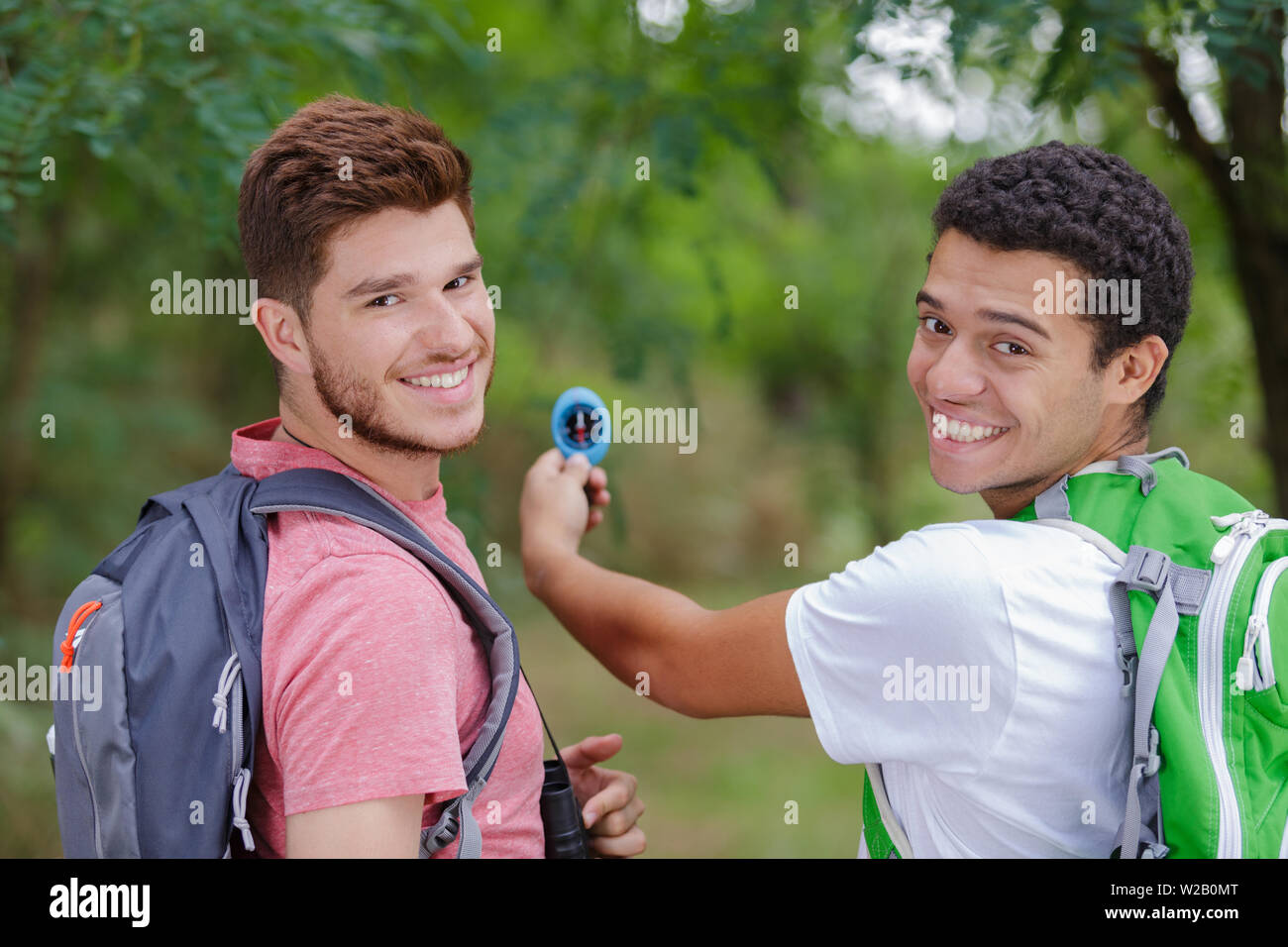 Male travelers in forest hi-res stock photography and images - Alamy