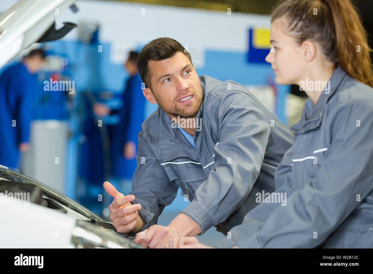 Portrait happy mechanic female customer hi-res stock photography and ...