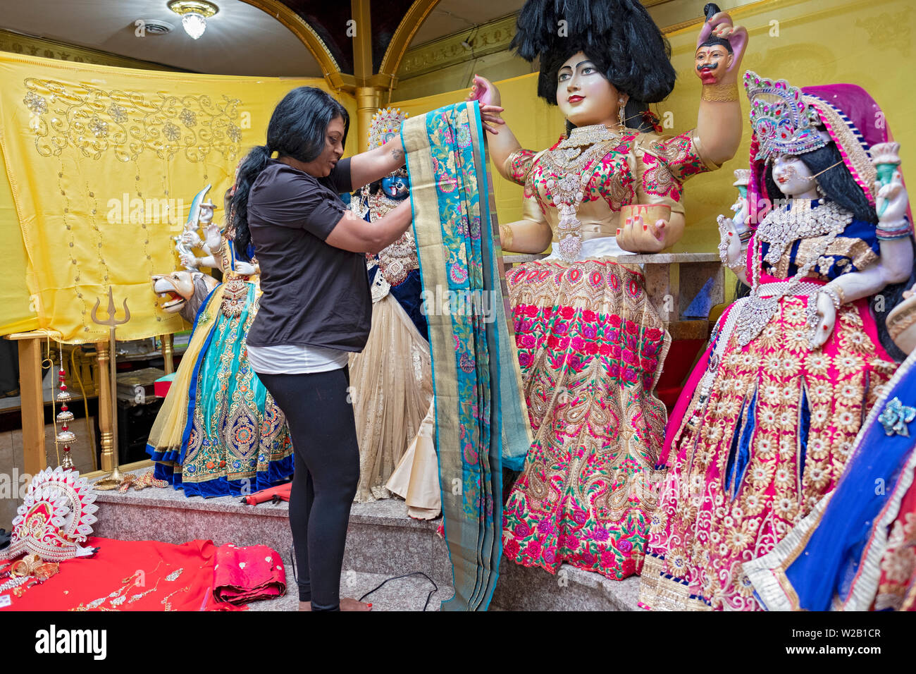 As part of a thanks giving ritual, a devout Hindu woman designed and ...