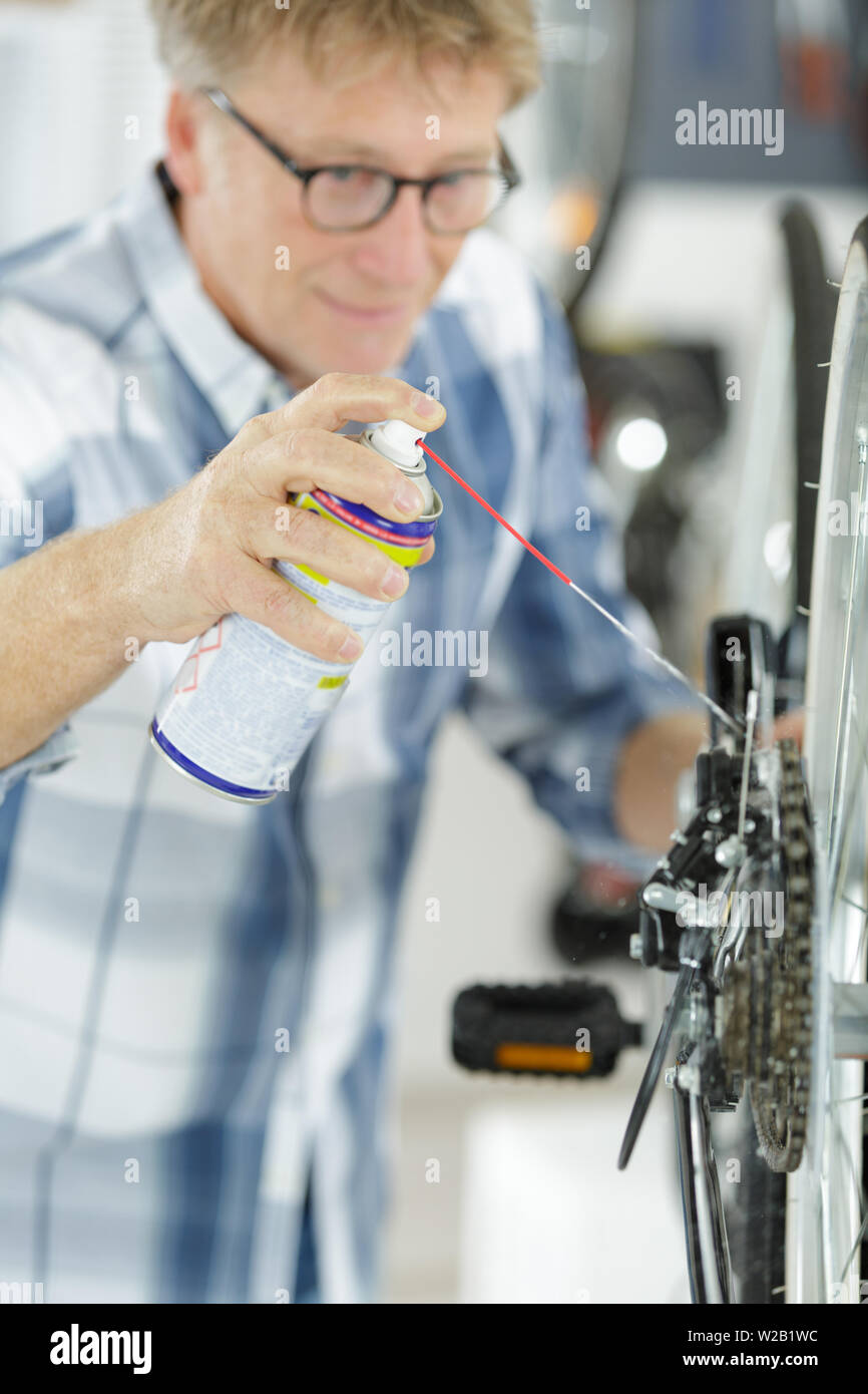 Oiling bike hi-res stock photography and images - Alamy