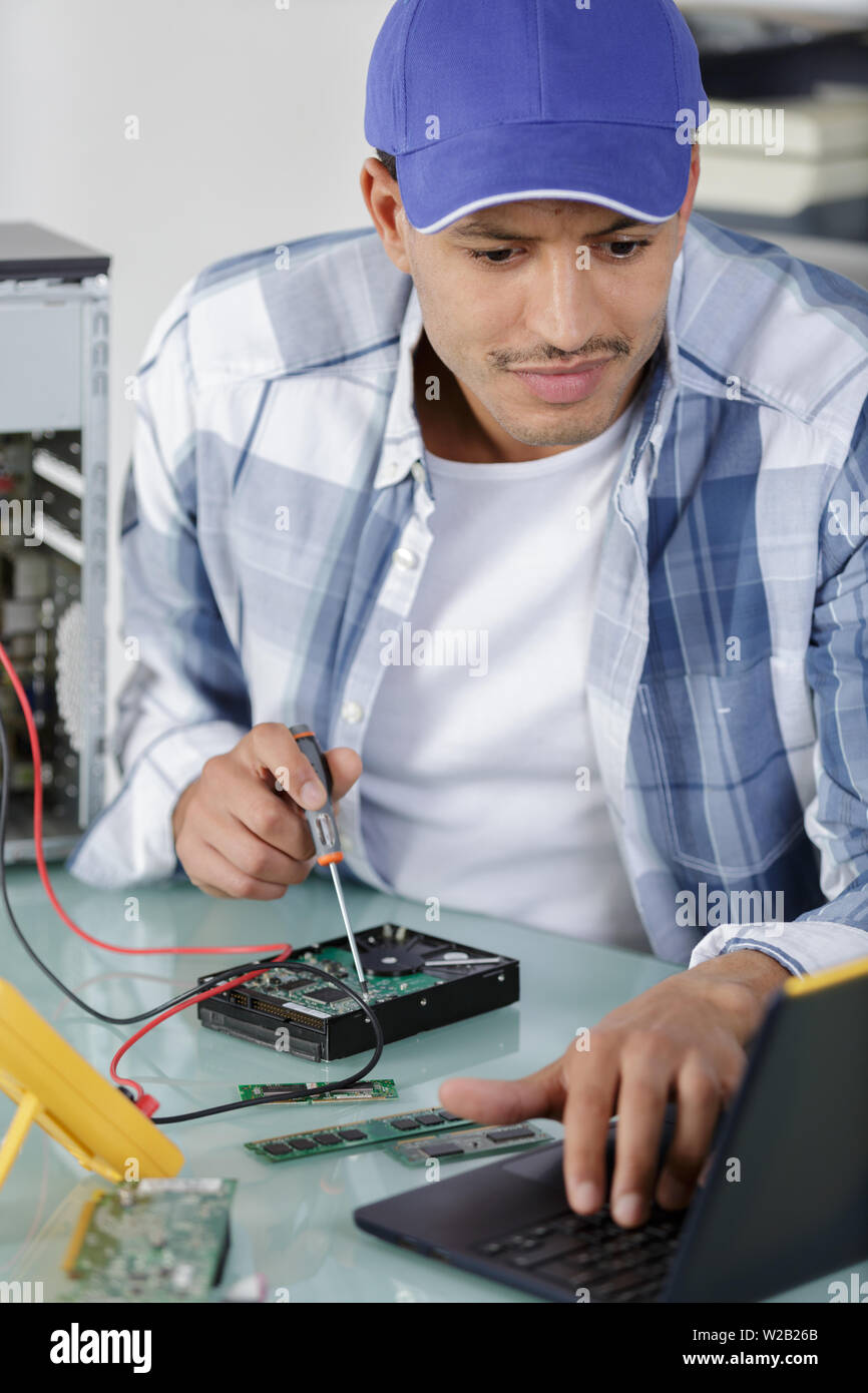 computer repairman specialist repairing computer desktop Stock Photo ...