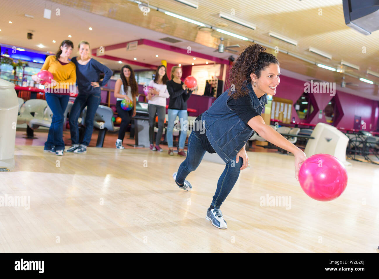 Child woman bowling hi-res stock photography and images - Alamy