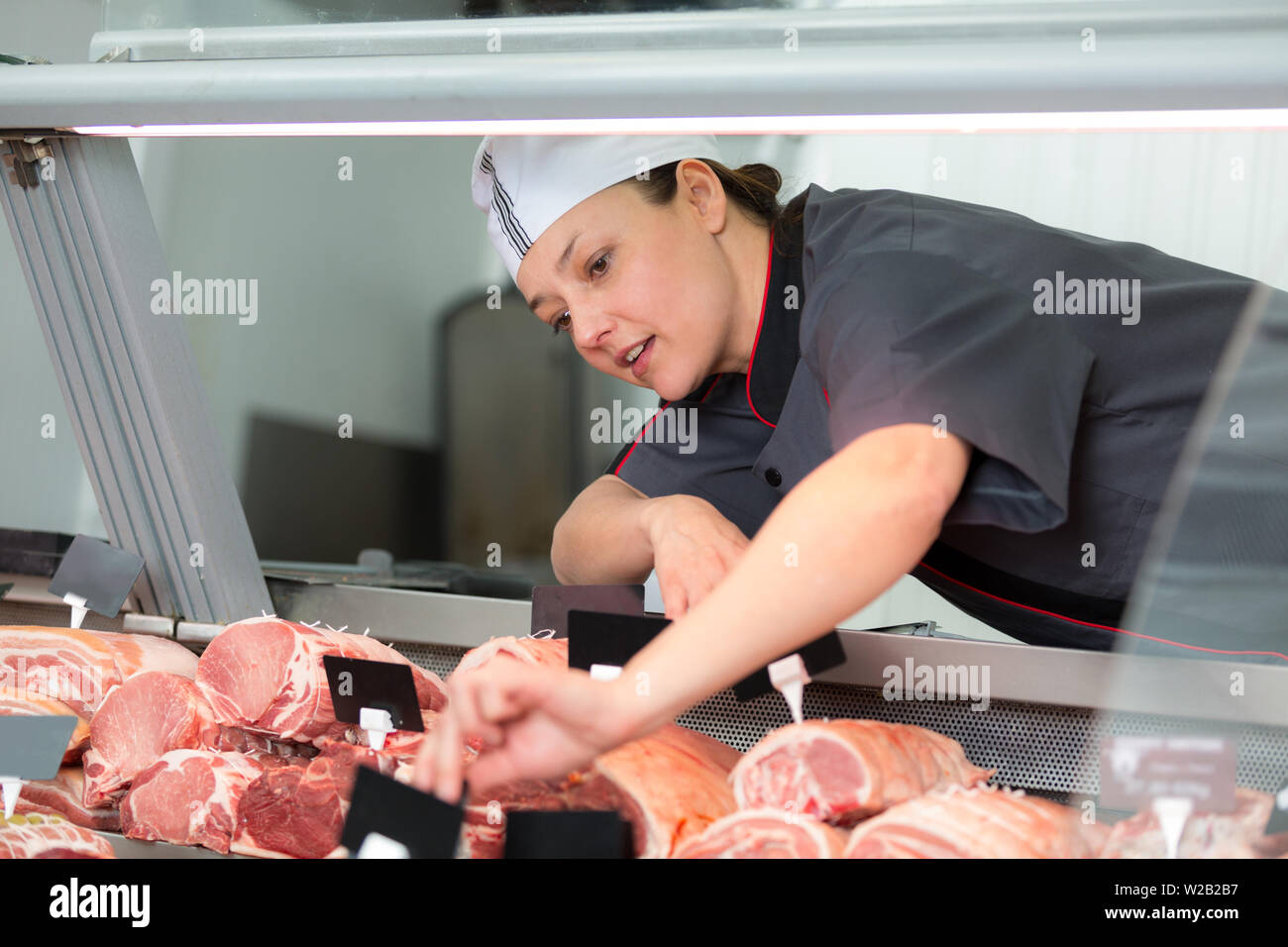 female butchers in a supermarket at work Stock Photo - Alamy