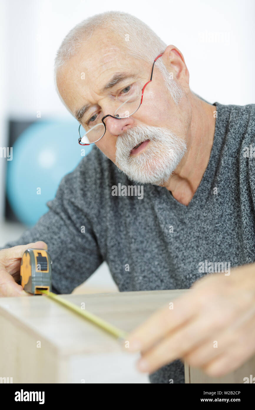 Measuring the furniture hi-res stock photography and images - Alamy