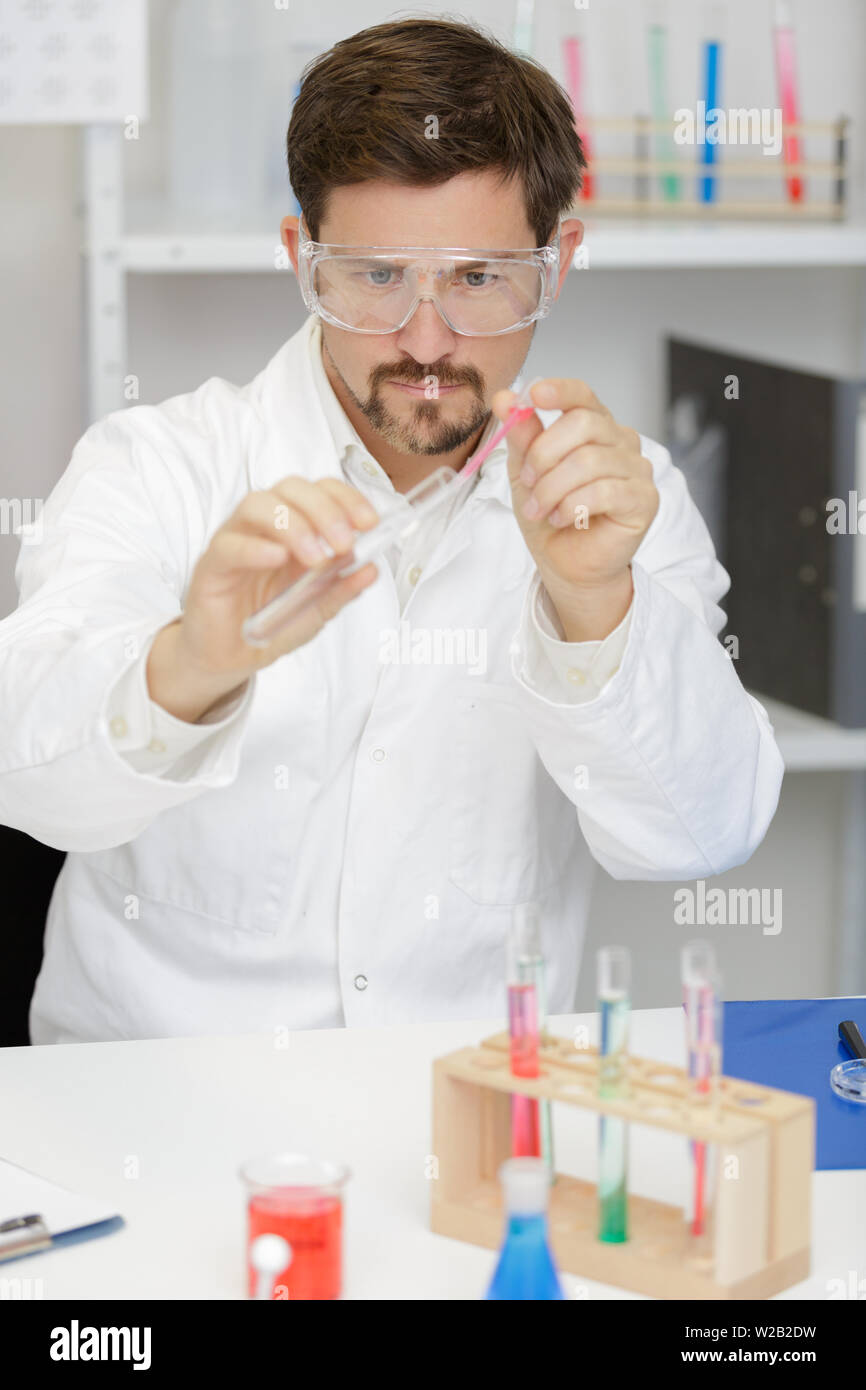 young researcher scientist doing a test Stock Photo - Alamy