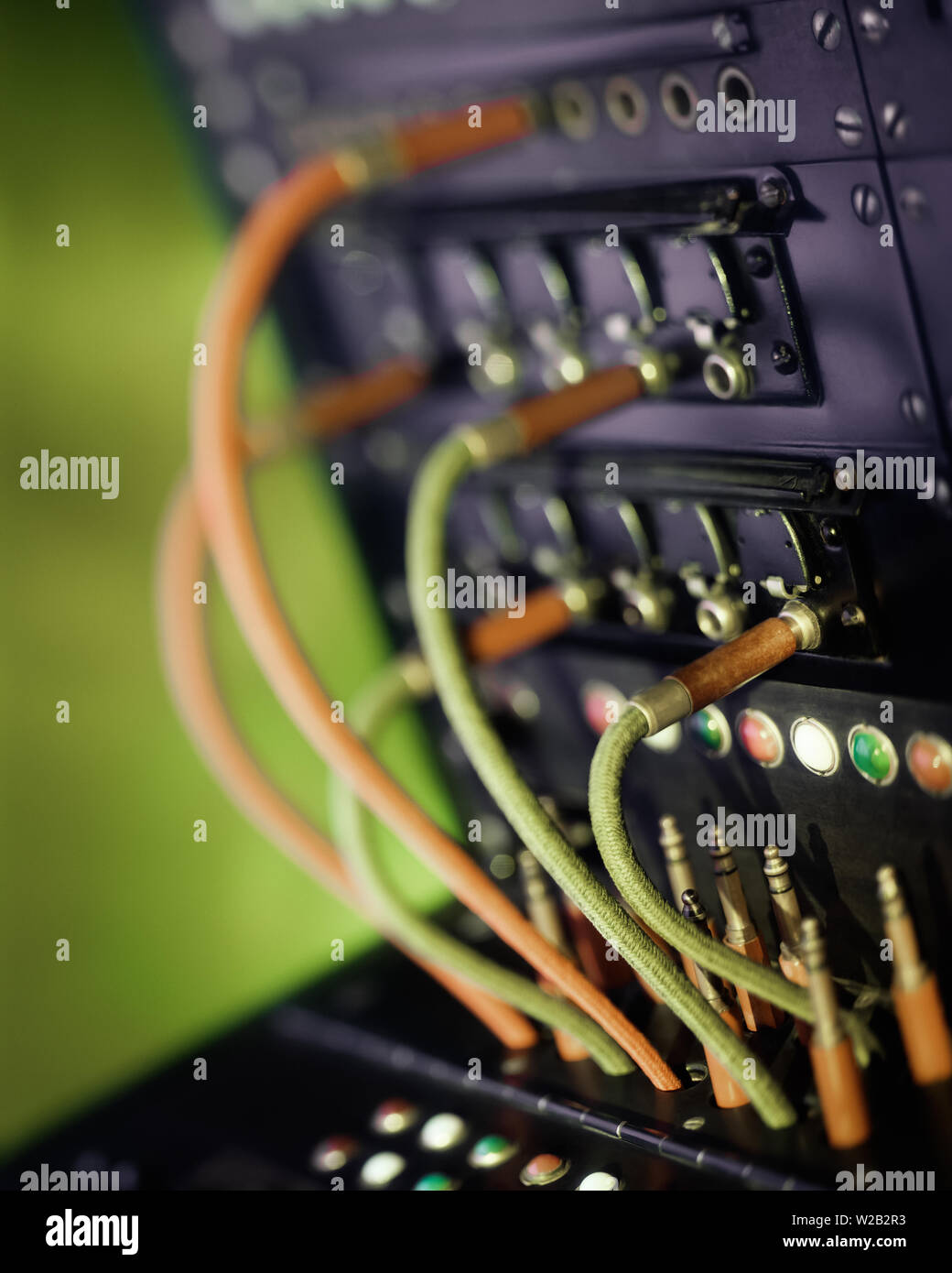 Old antique telephone switchboard with cable and plug connections ...
