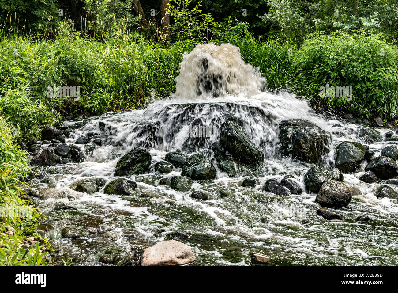 mixing zone of sewage discharge of urban sewage. river pollution. city ...