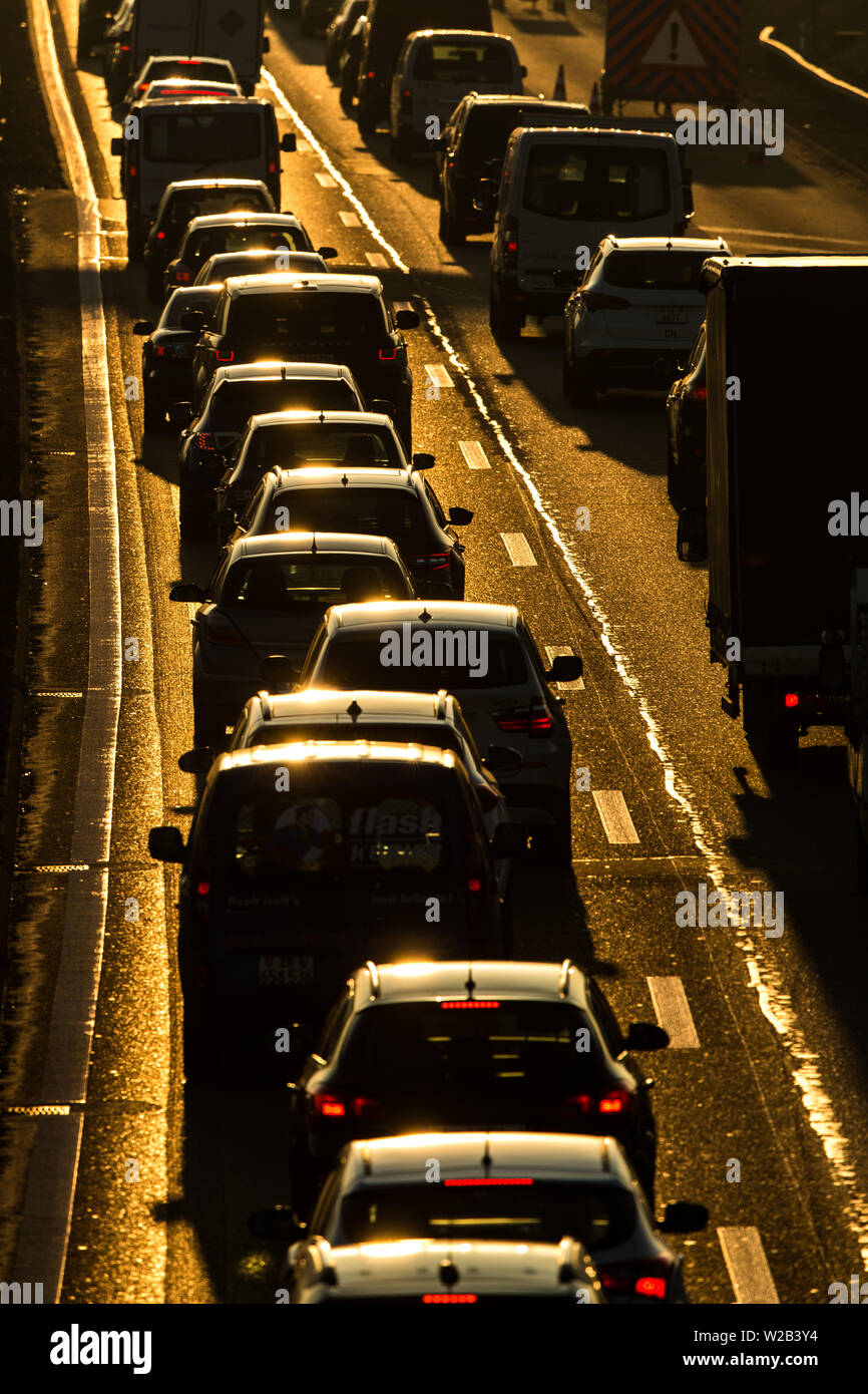 Heavy morning city traffic/congestion concept - cars going very slowly ...