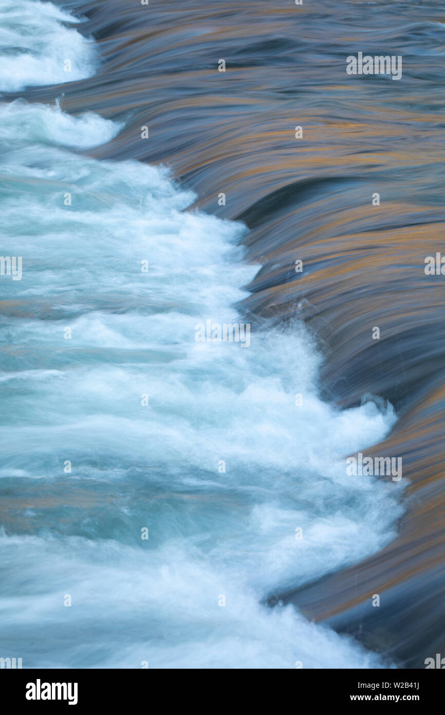 Water concept - river water flowing with light reflecting of its ...