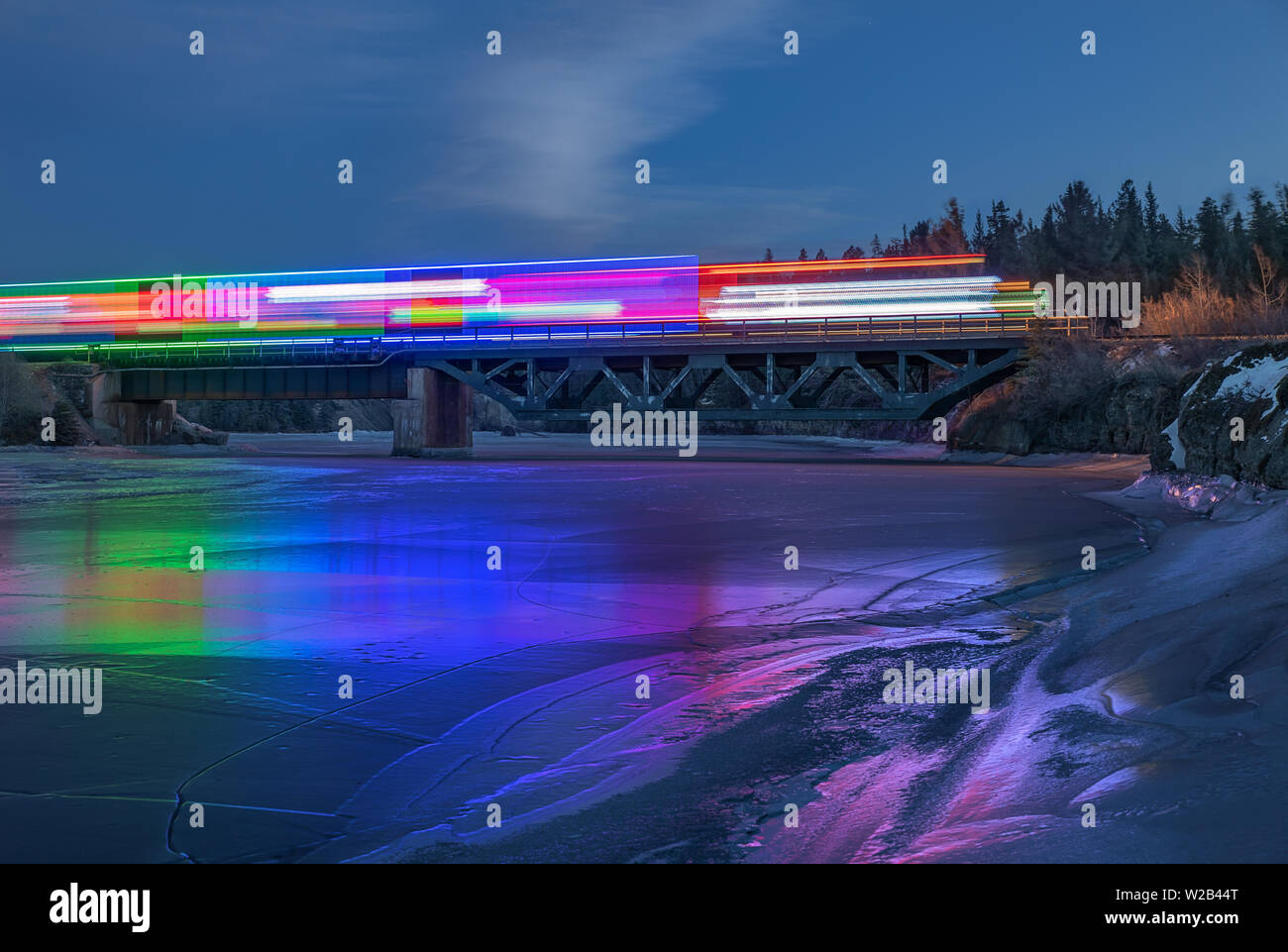 Holiday Train Crossing the Kananaskis River at the Seebe Dam in Alberta ...