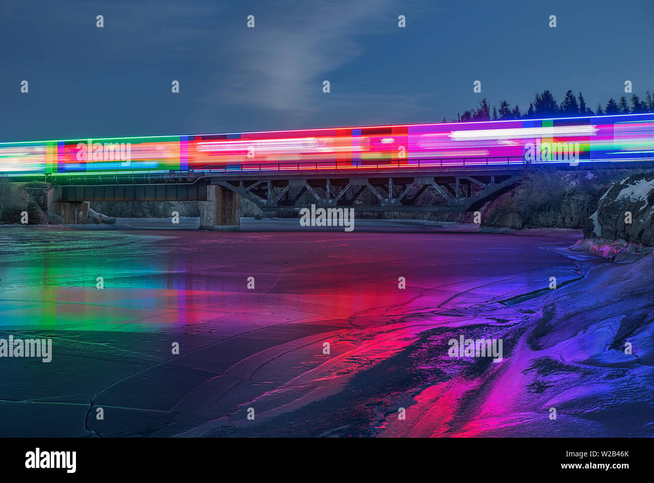 Holiday Train Crossing the Kananaskis River at the Seebe Dam in Alberta ...