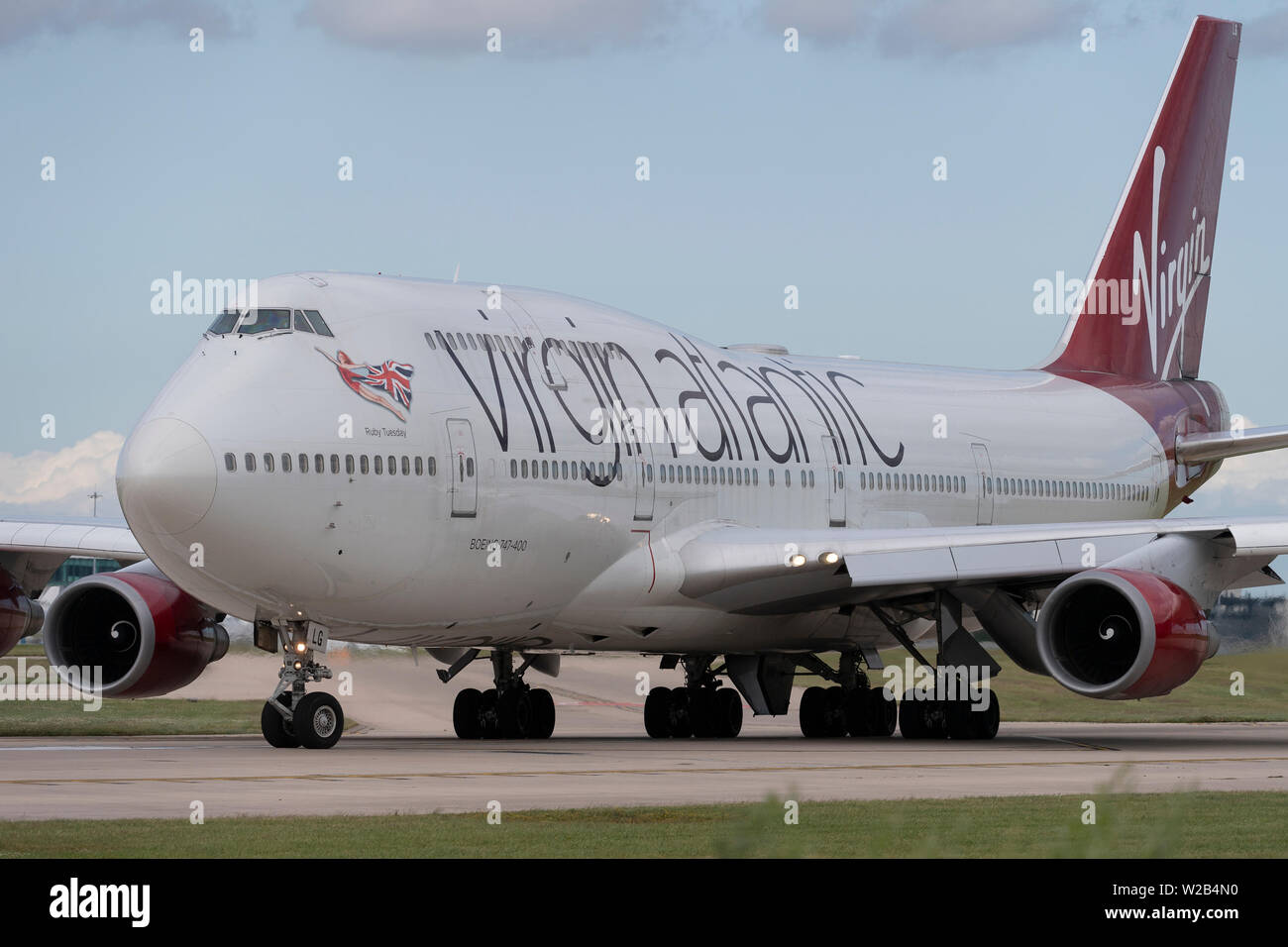 A Virgin Atlantic Boeing 747-400 taxis on the runway at Manchester ...